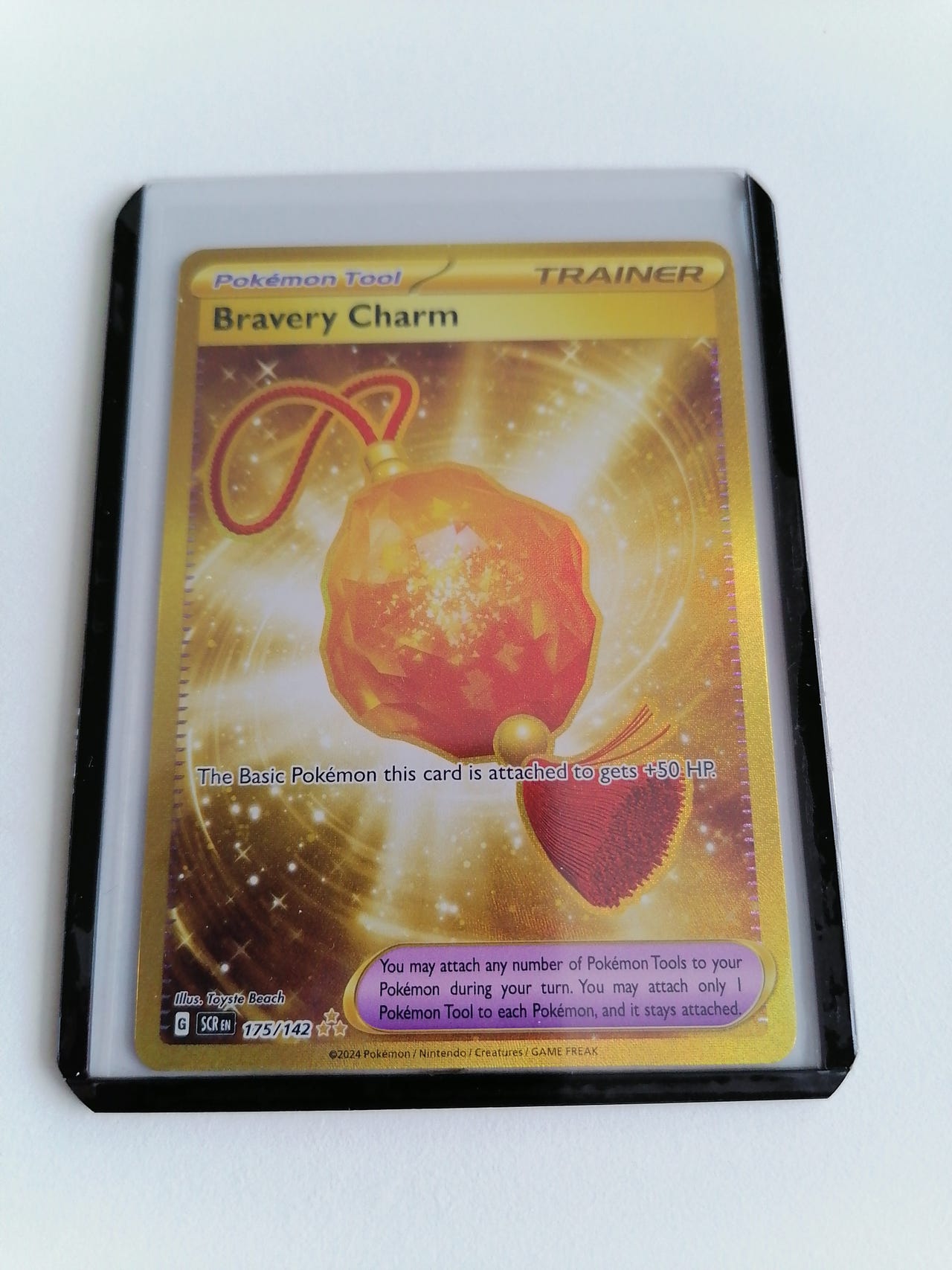 Bravery Charm (Stellar Crown) Pokemon-kortti | Tori