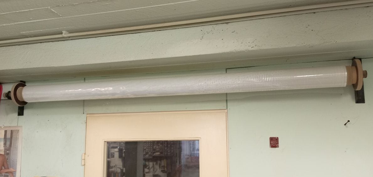 Pitkän rullan teline ja muovikalvoa | Tori