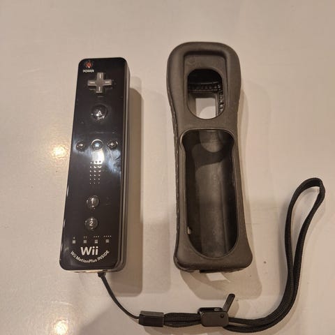 Nintendo wii. Nunchuk musta ohjain. | Tori